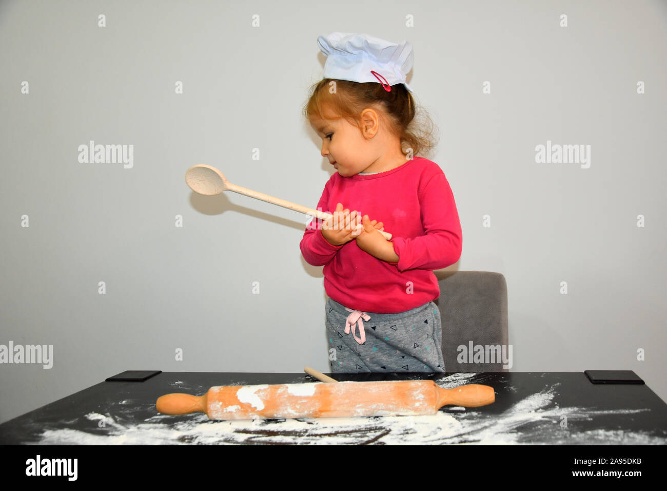 Cute boy cooking in kitchen at home Stock Photo - Alamy
