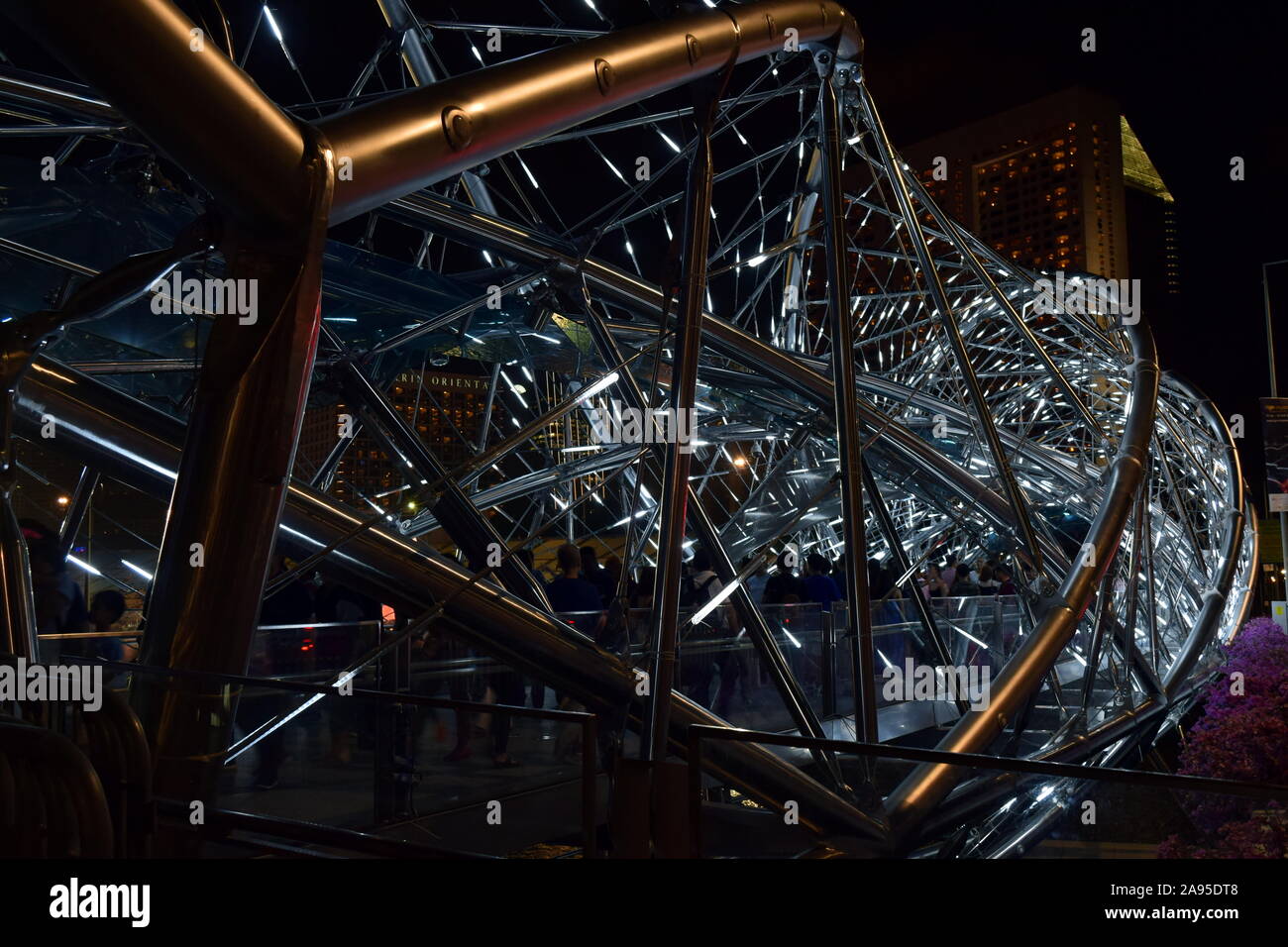 Helix Bridge in evening lights, Singapore Stock Photo - Alamy