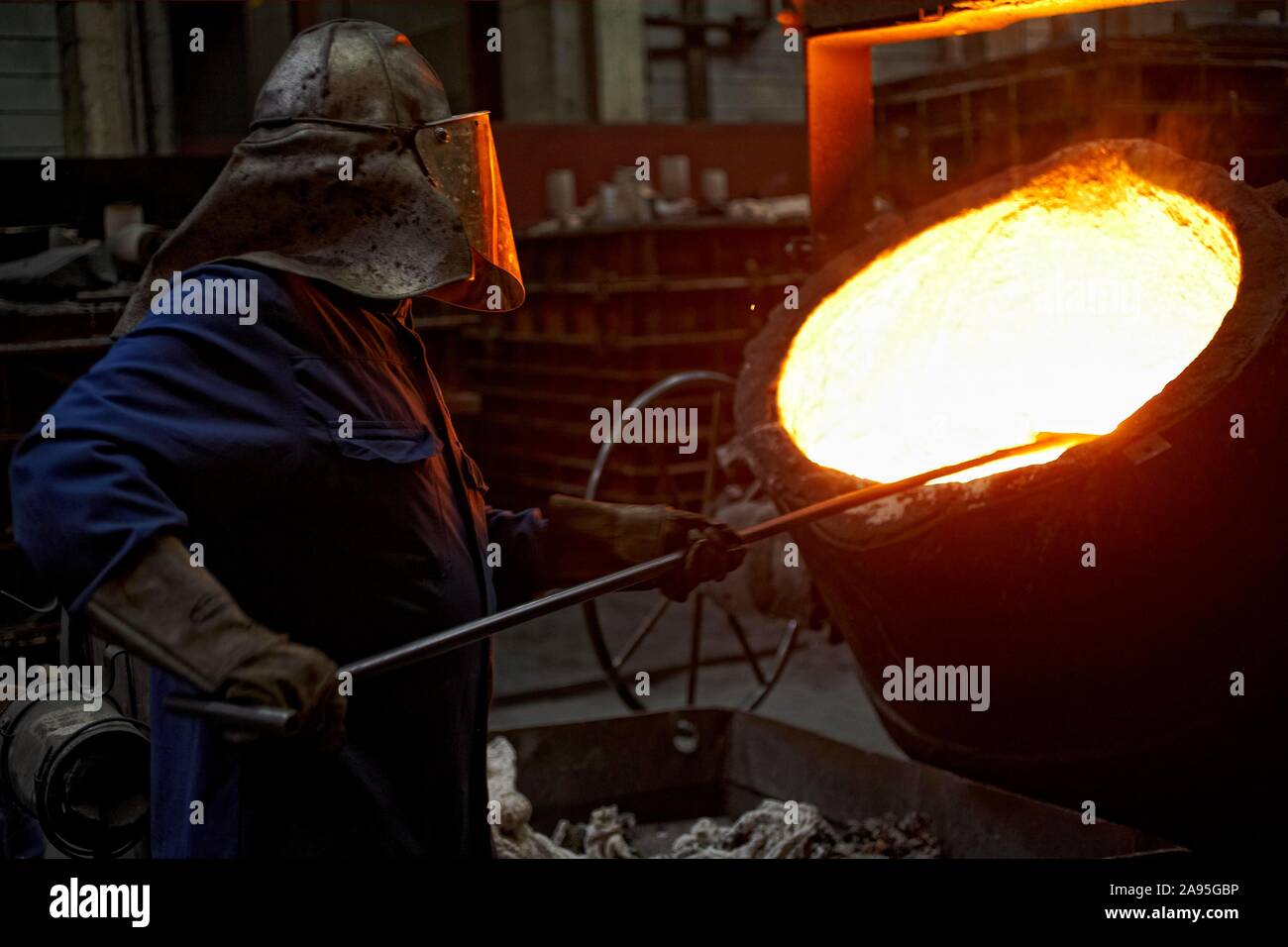 Worker on tanks with liquid iron hi-res stock photography and images ...