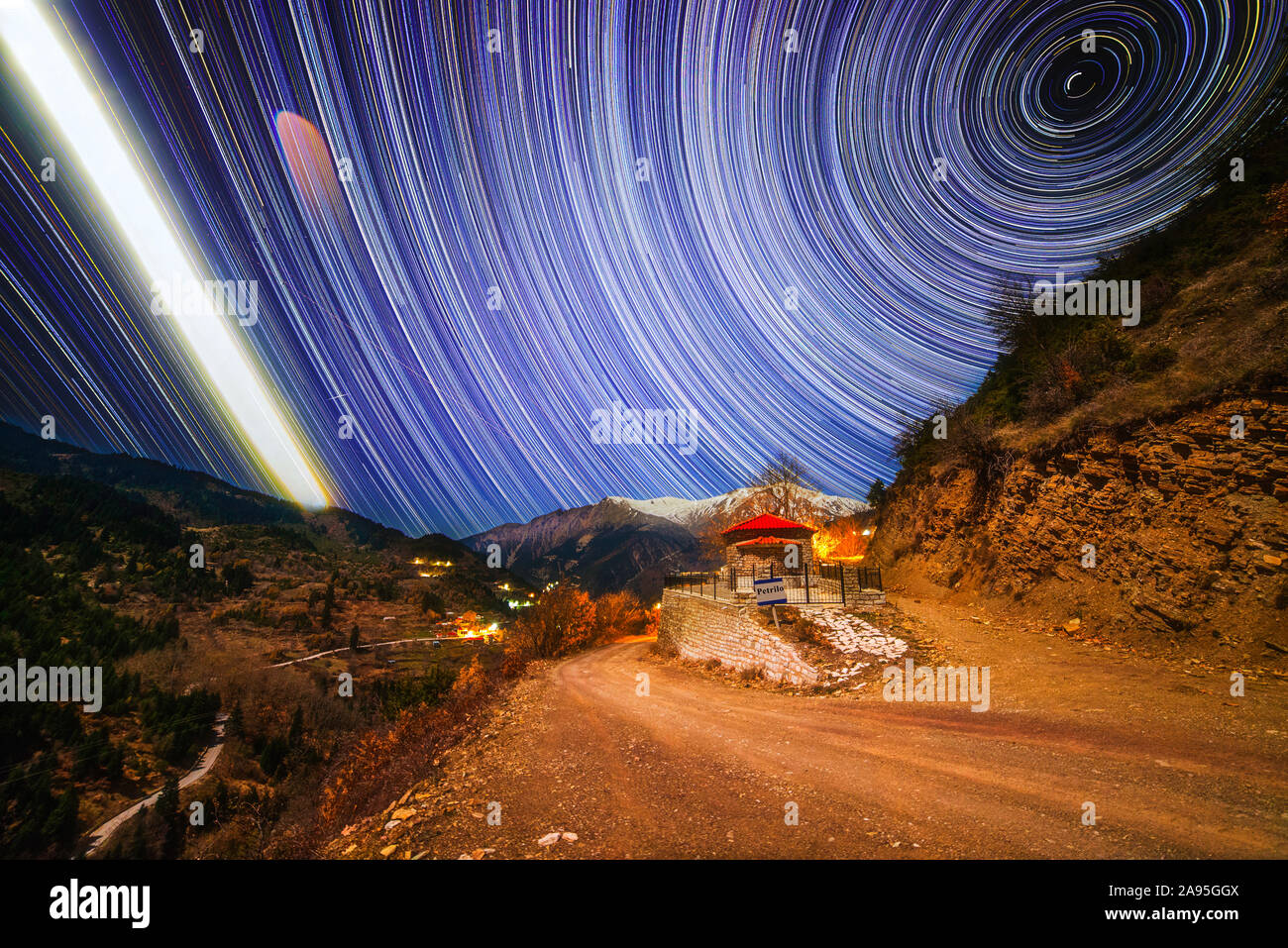 Star and moon trails on a winter night on Agrafa Mountains Stock Photo ...