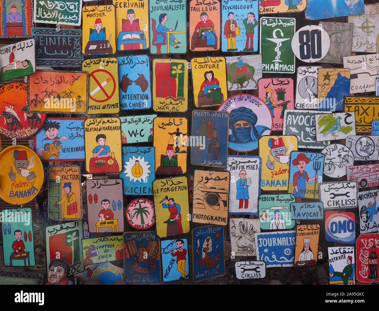 Shop with traditional painted signs, Souk of Marrakech, Morocco Stock ...