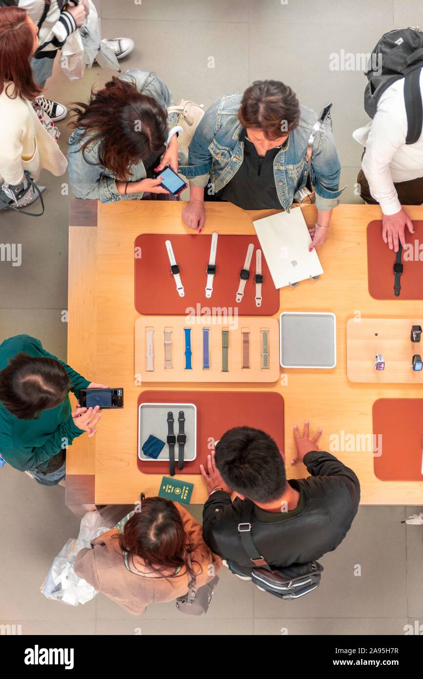 People at the Apple Store shopping, table with watches, iWatch, Ginza ...