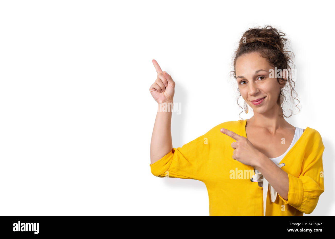 woman showing finger on copy space for product or text, isolated of the ...