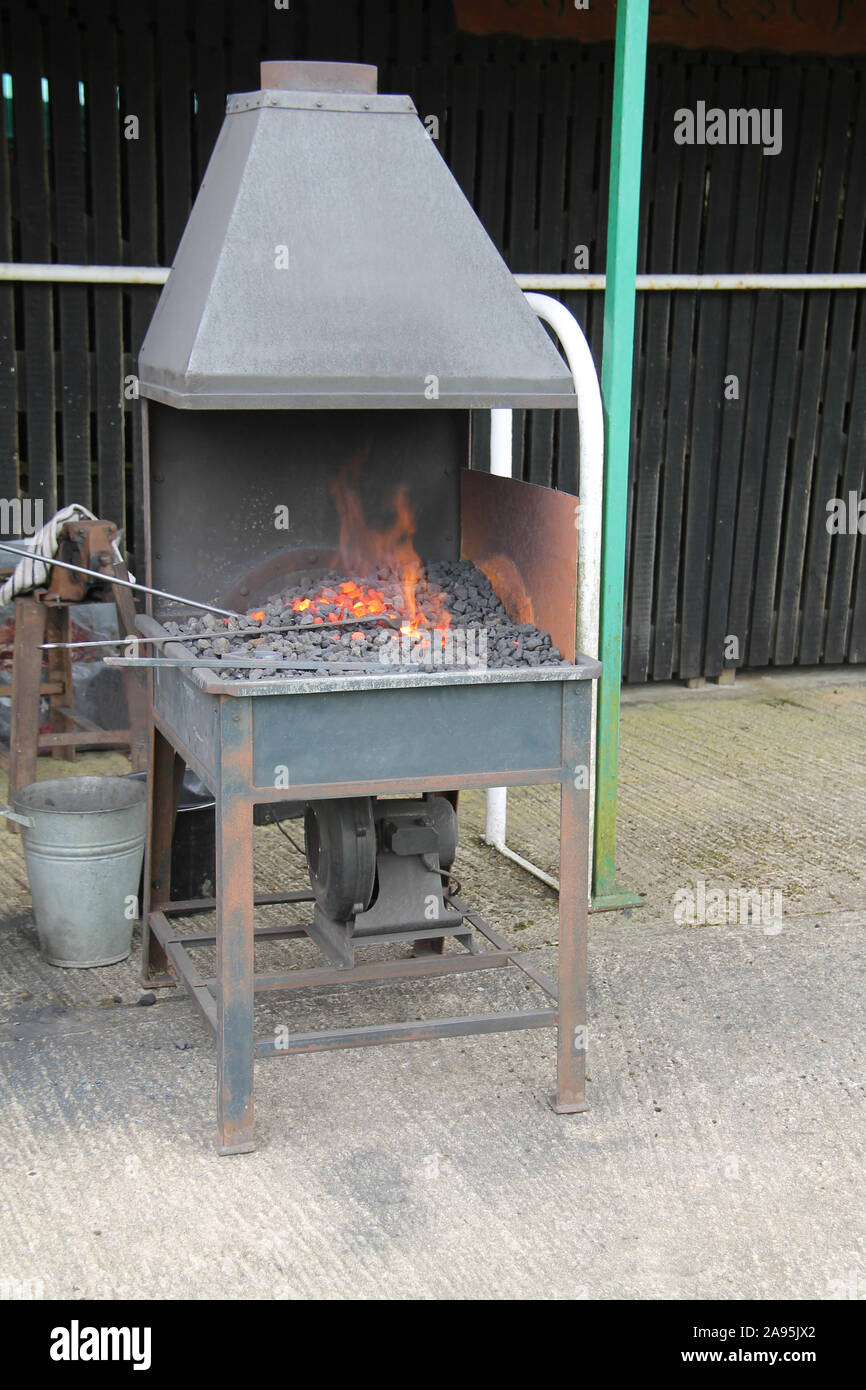 The Flames of a Coal Fired Blacksmiths Working Hearth Stock Photo - Alamy