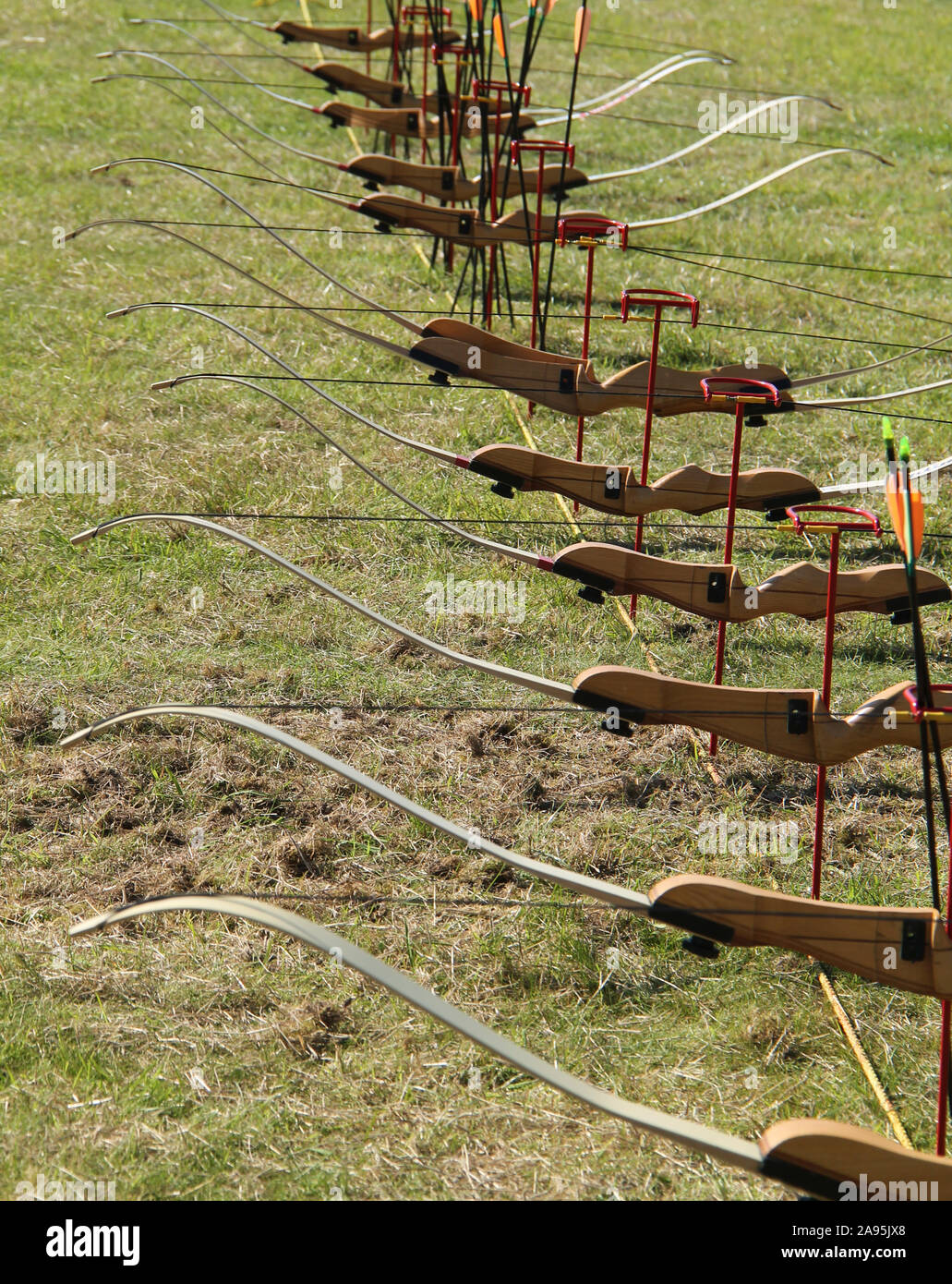 A Line of Stands for Archery Bows and Arrows Stock Photo - Alamy