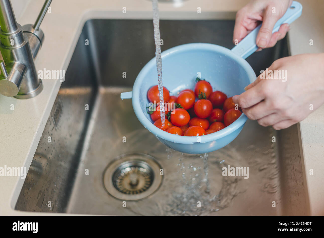 Healthy eating cooking woman wash hi-res stock photography and images ...