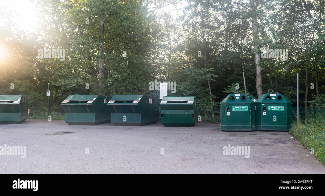 iron recycling containers on the street closeup Stock Photo - Alamy