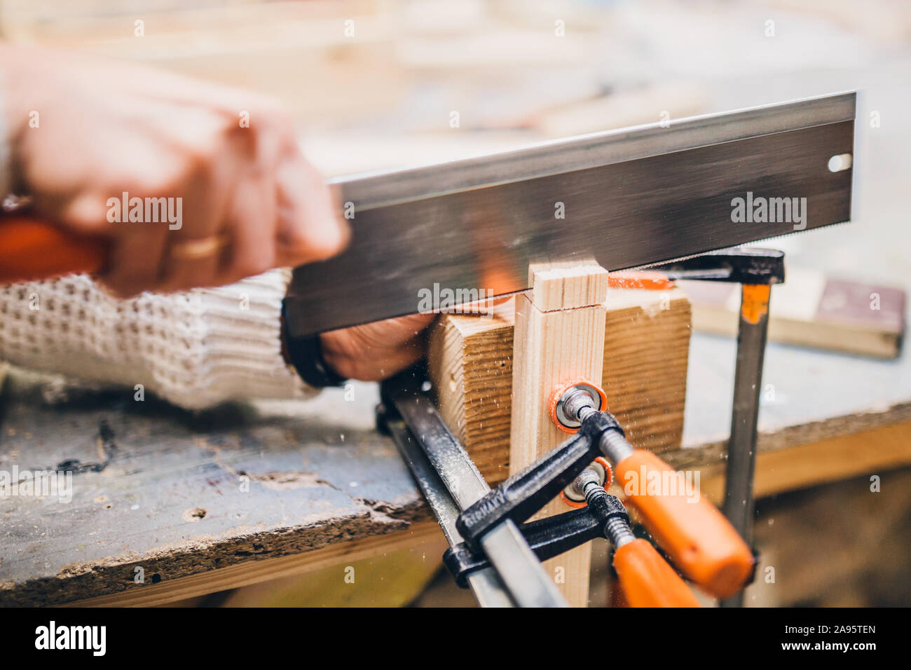 Cutting timber woman hi-res stock photography and images - Alamy