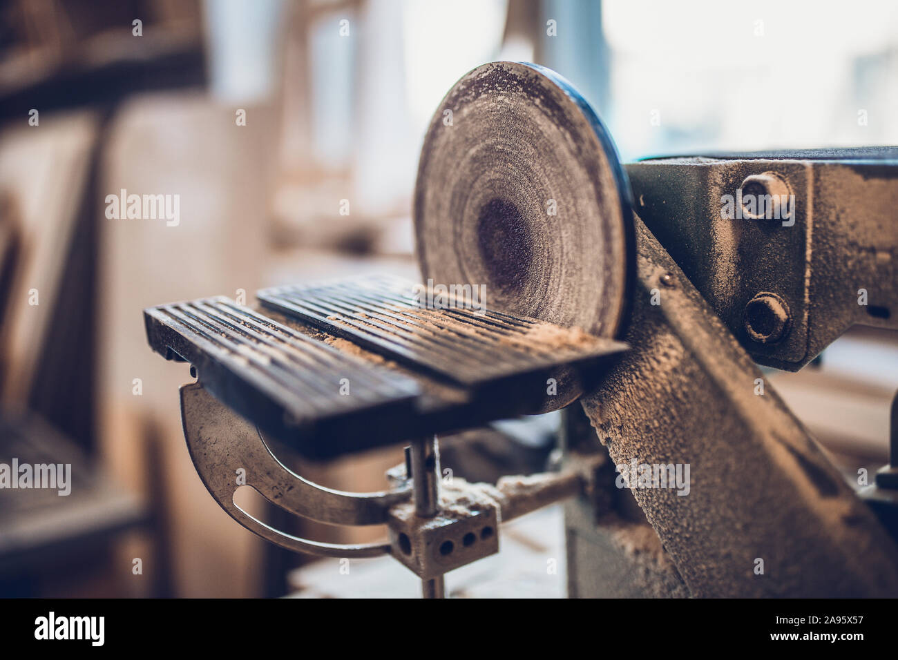 Grinding machine - disc and belt grinding - woodwork Stock Photo - Alamy