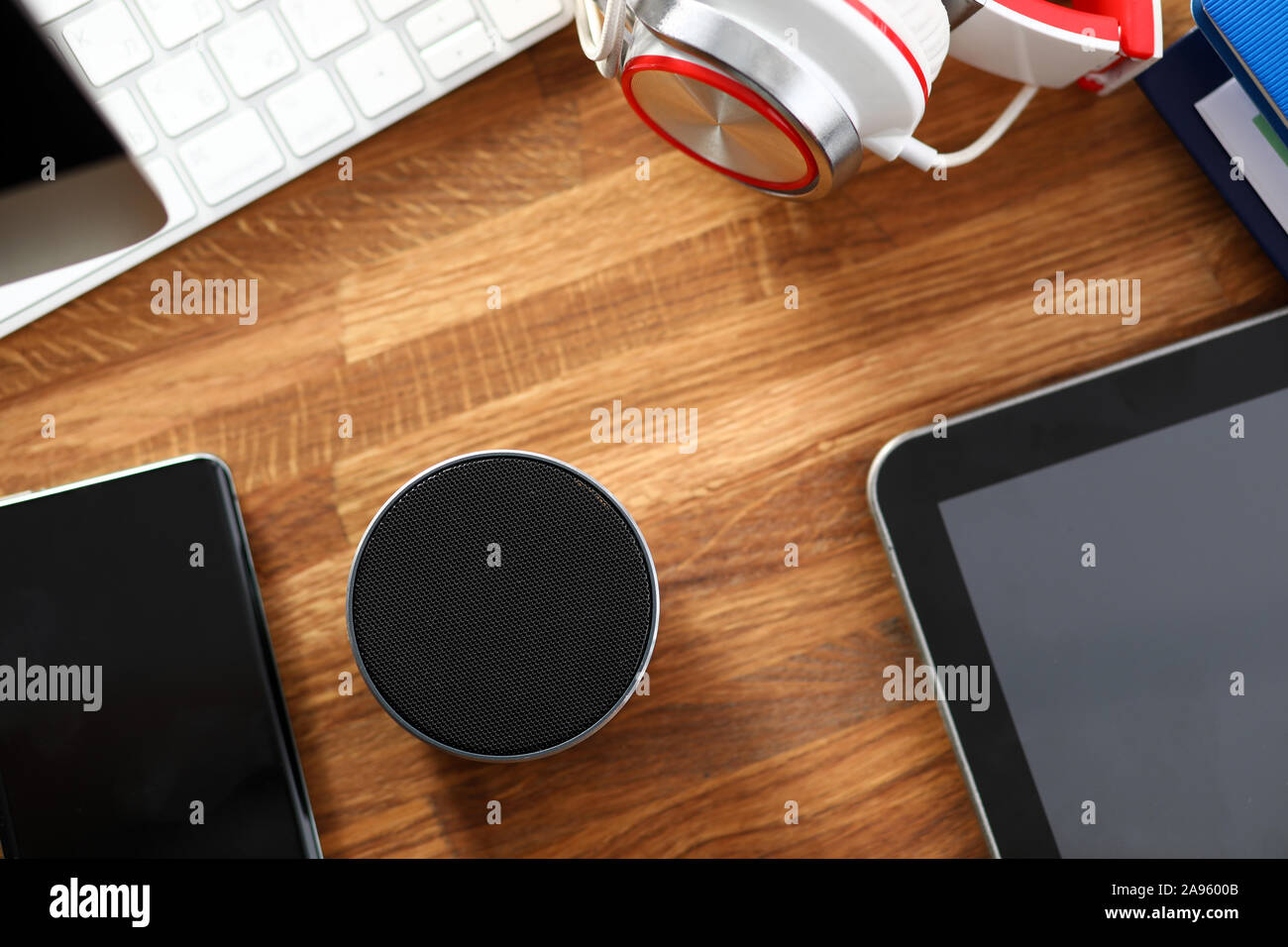 Set of media gadgets lying at table surface Stock Photo - Alamy