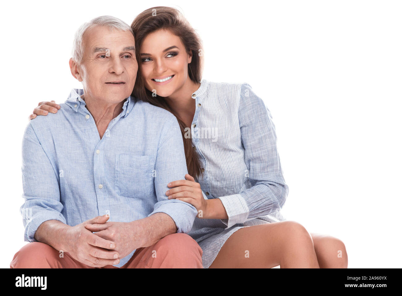 Beautiful woman and her eldery father on white background Stock Photo ...
