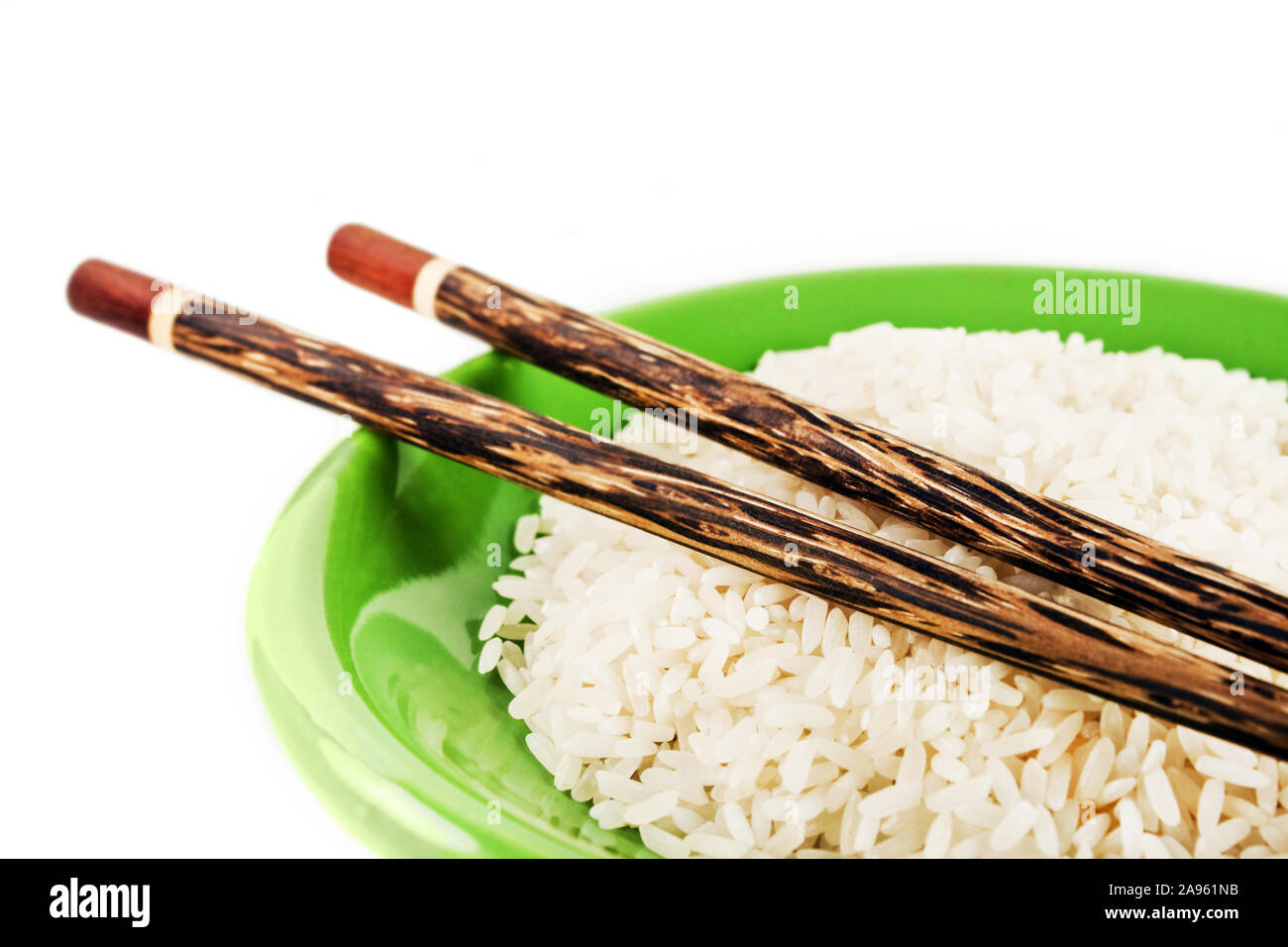 White polished rice and sticks Stock Photo - Alamy