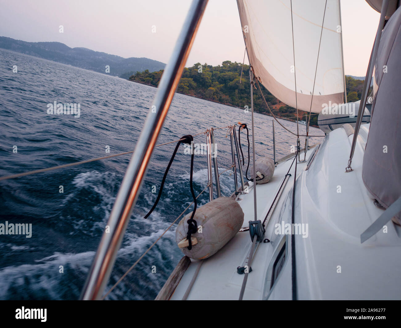 Tailwind, the concept of moving forward on all sails. Boat trip on a ...