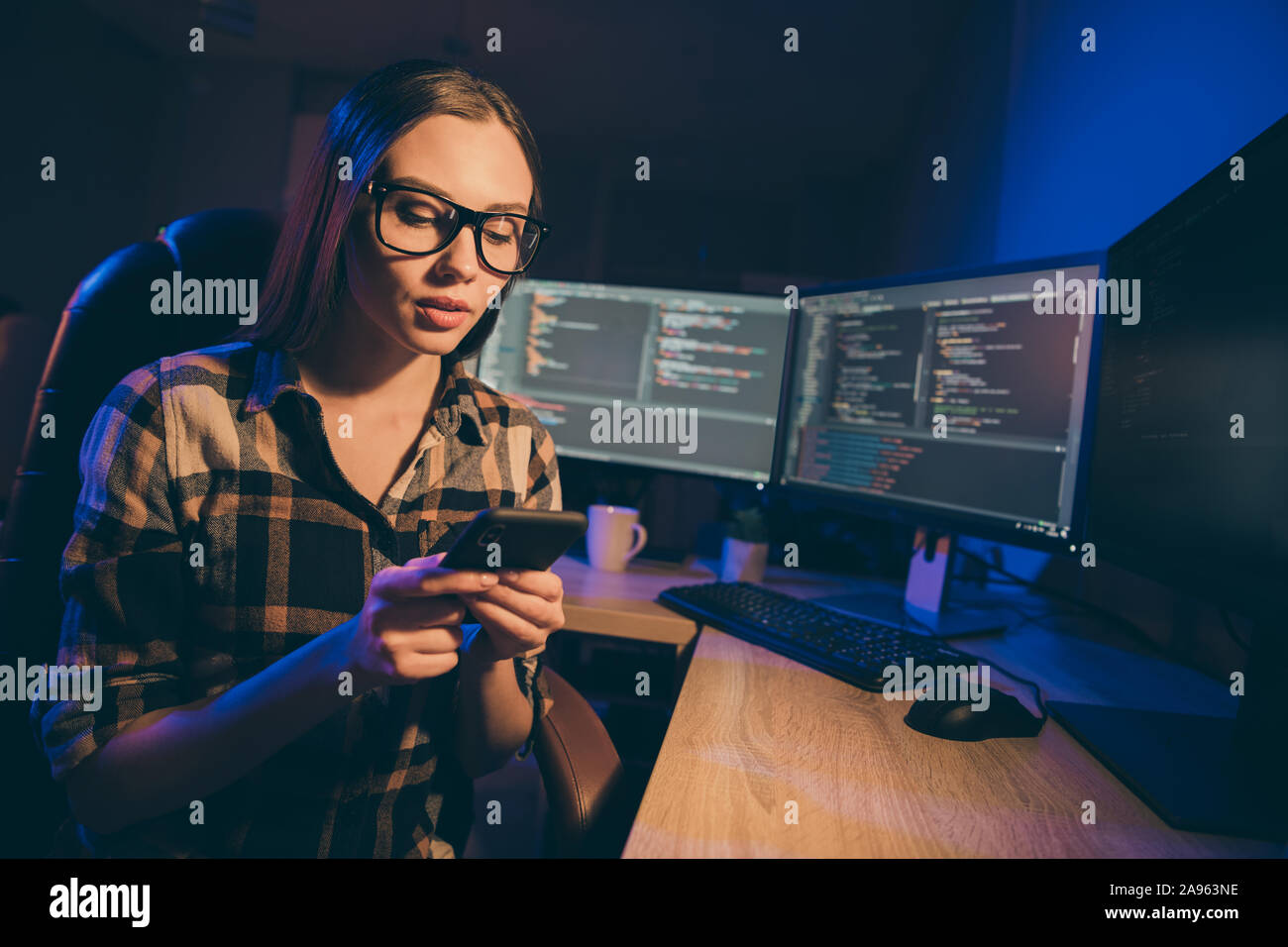Photo of cute girl wearing spectacles working on startup and project at ...
