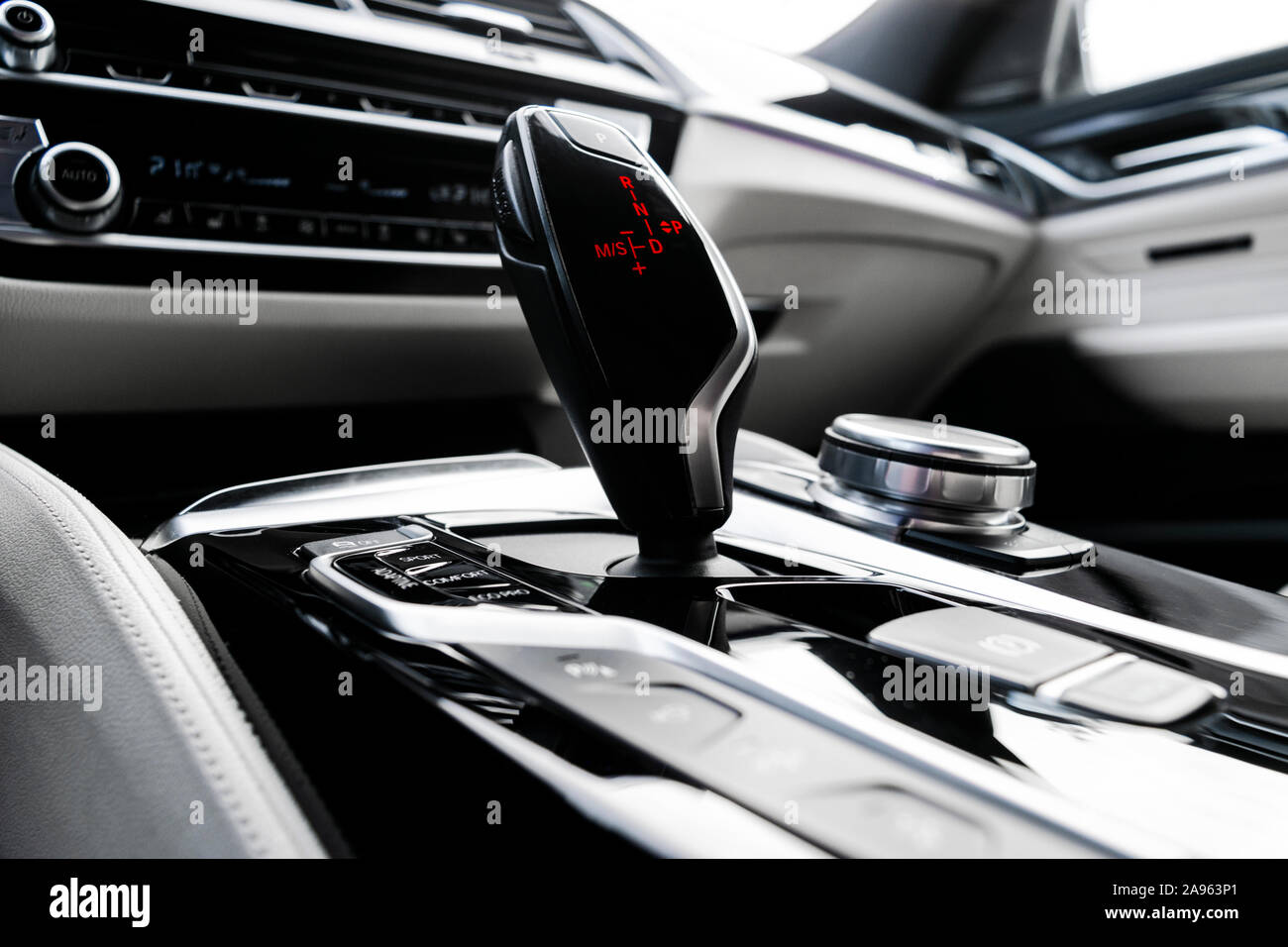 Automatic gear stick of a modern car. Modern car interior details. Close up view. Car detailing ...