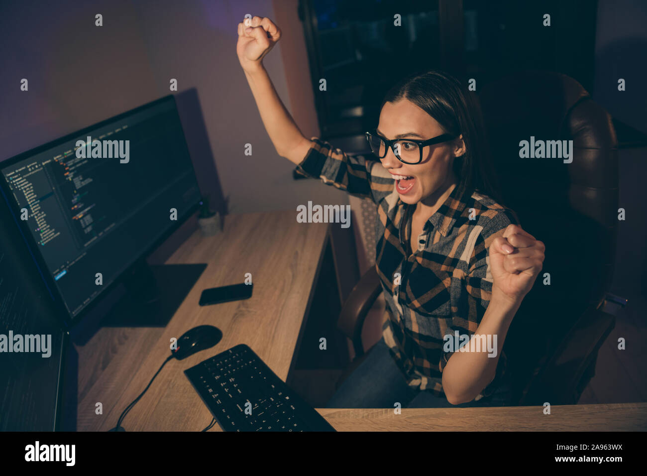 Photo of excited crazy geek having completed all the assignments given ...