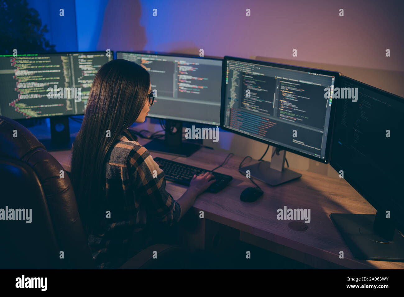 Photo of focused concentrated serious programmer searching for mistakes ...
