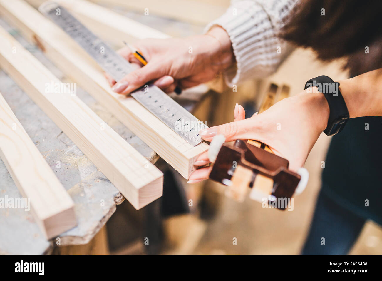 Manual processing of wood in the carpentry workshop - marking and ...