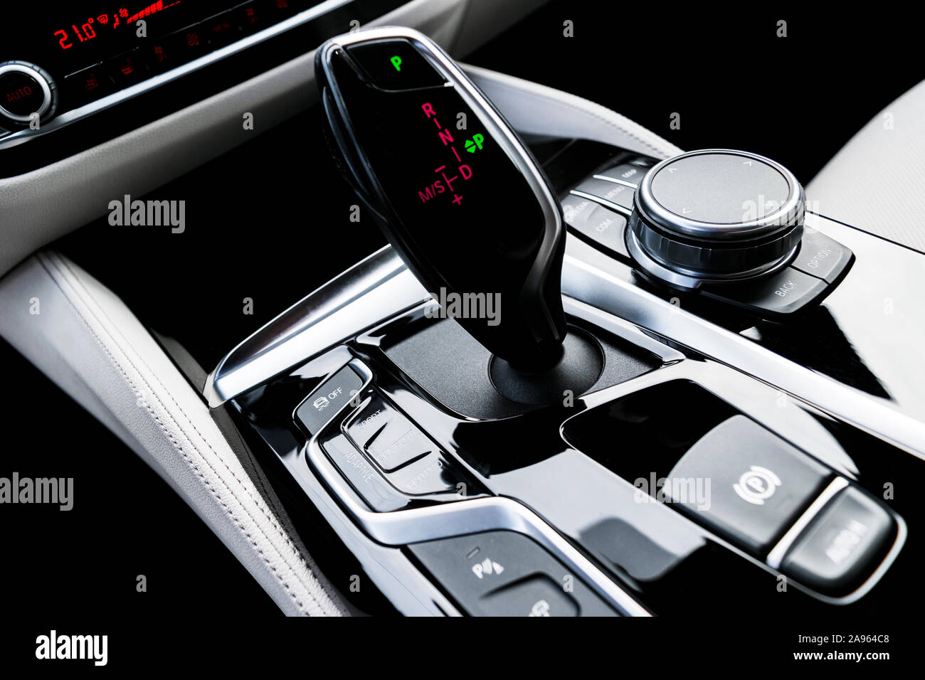 Automatic gear stick of a modern car. Modern car interior details ...