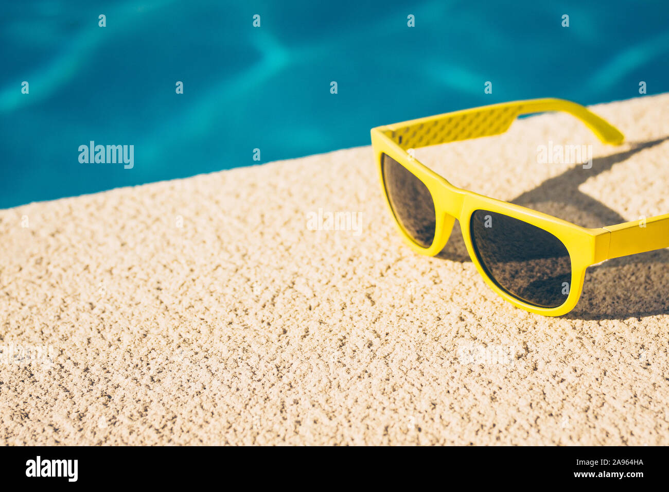 Sunglasses by the pool - a concept of recreation at the resort Stock ...