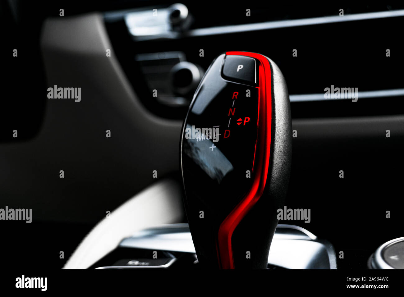 Automatic gear stick of a modern car. Modern car interior details. Close up view. Car detailing ...