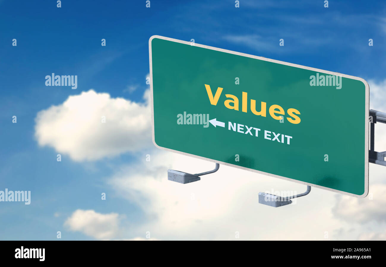 Values text on 3D highway road sign against a blue sky with cloudscape ...