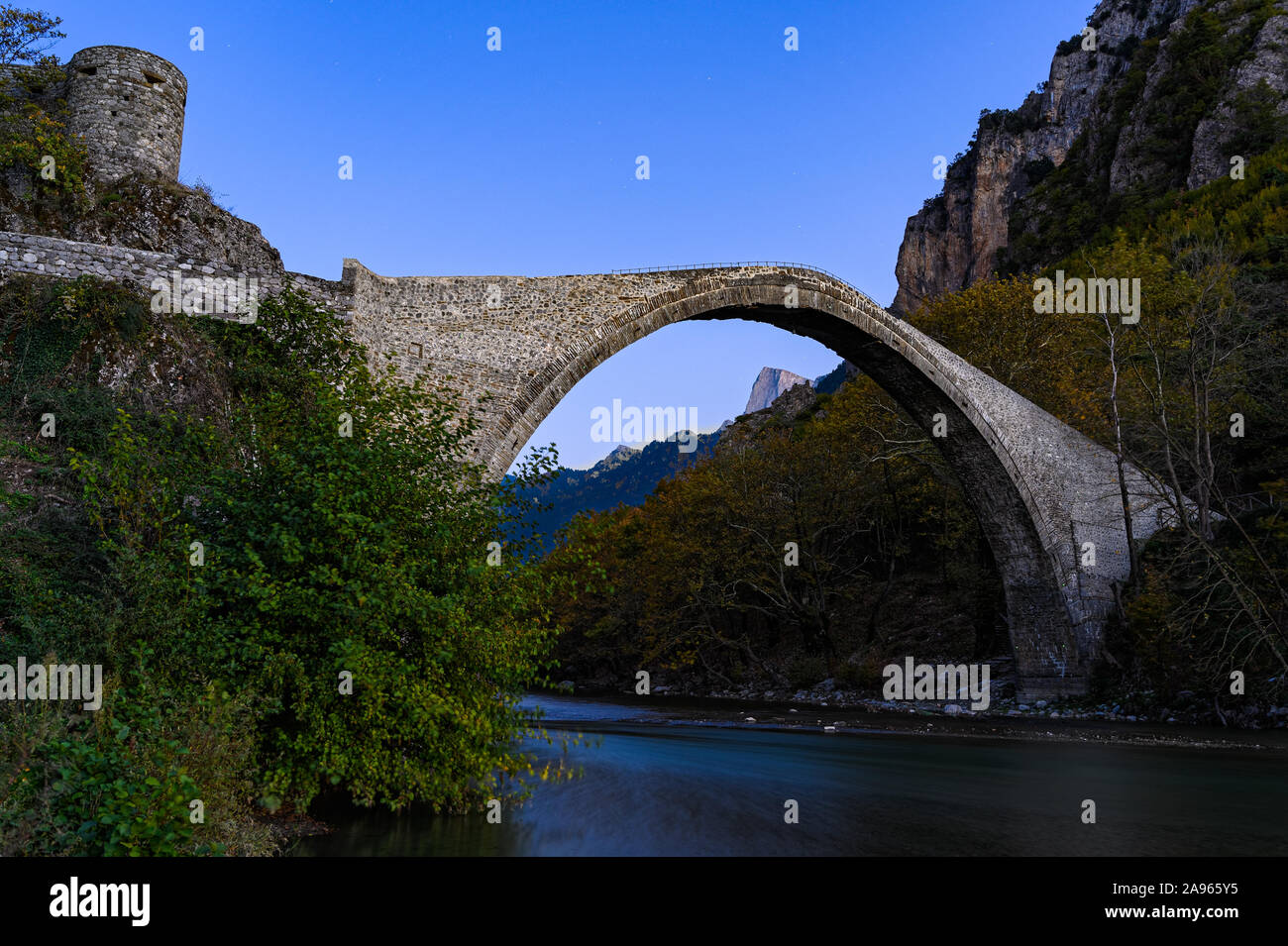 The traditional stone Bridge of Konitsa in Epirus, Greece Stock Photo ...