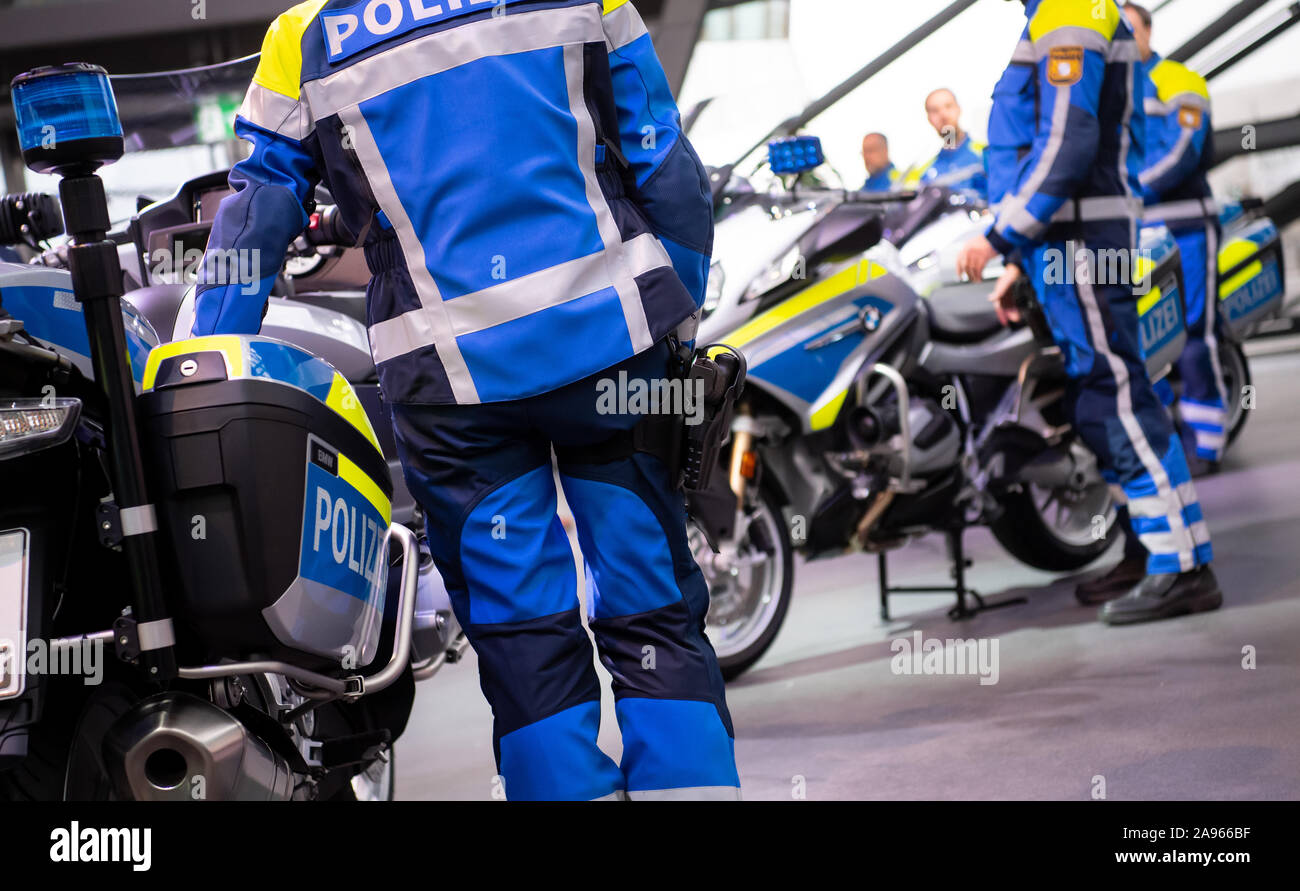 Munich, Germany. 13th Nov, 2019. Police officers stand next to the ...