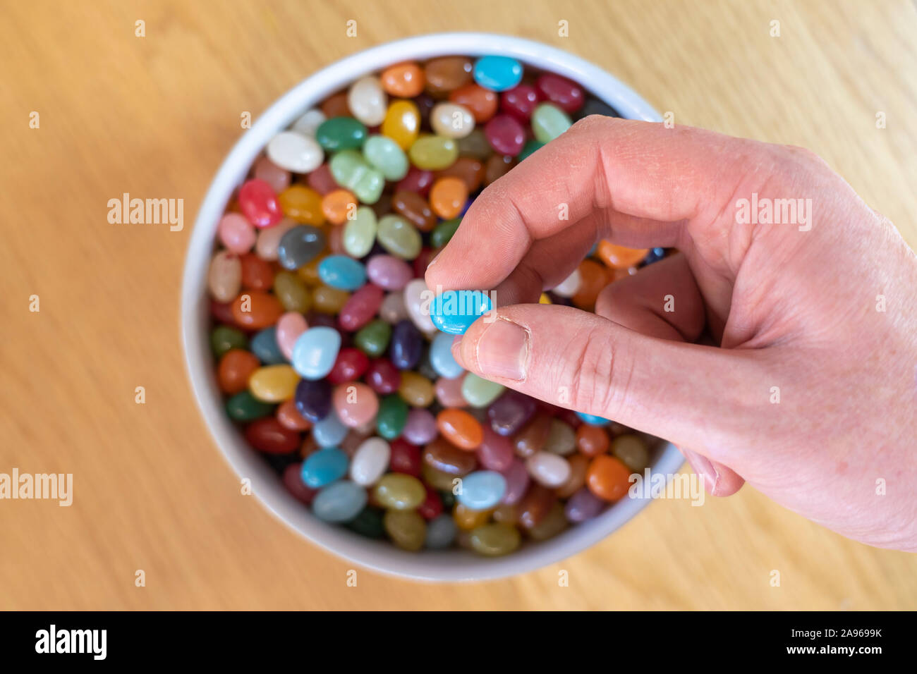 Holding sweets hi-res stock photography and images - Alamy