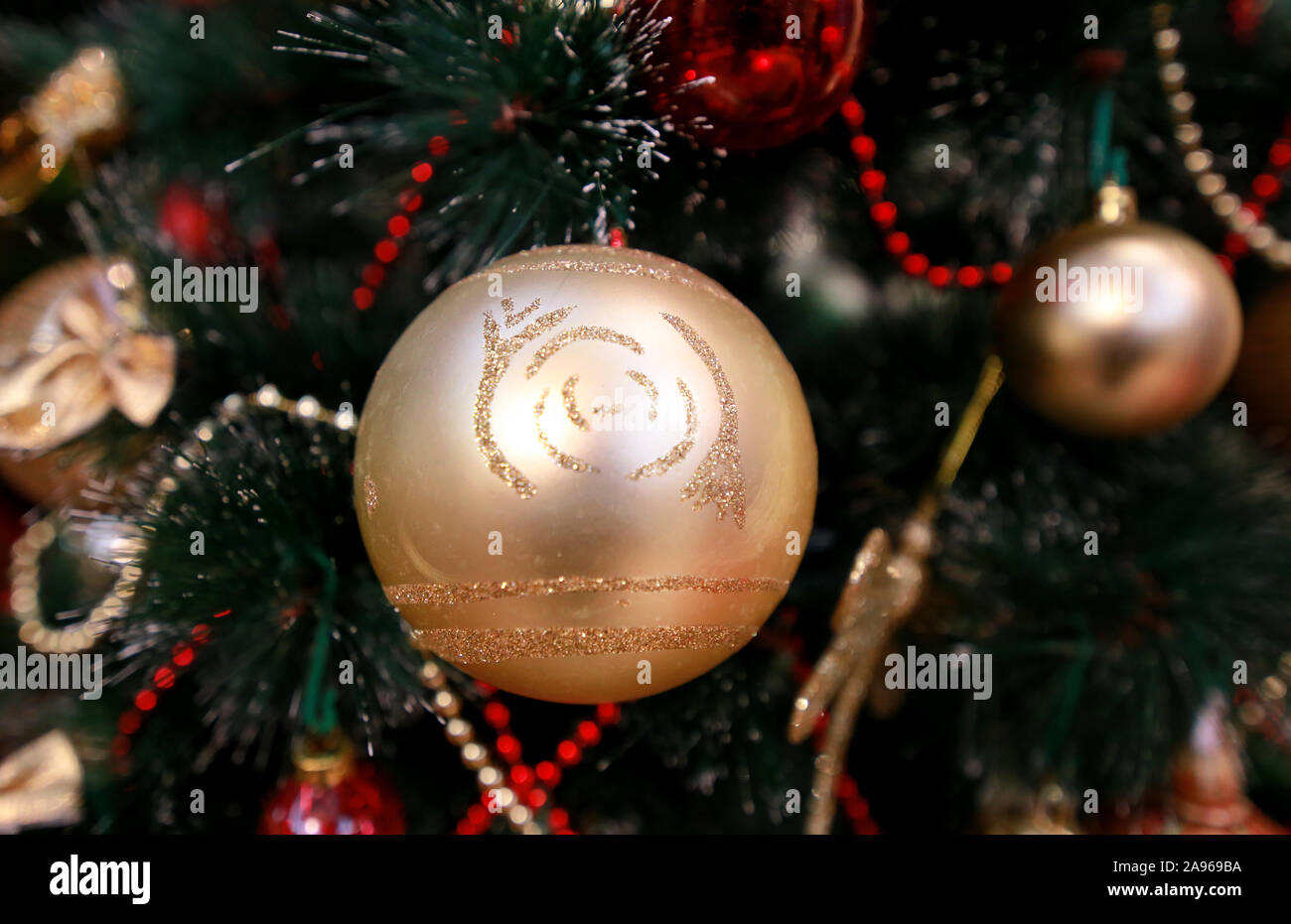 New Years colorful decoration ornaments on Christmas tree. Room ...