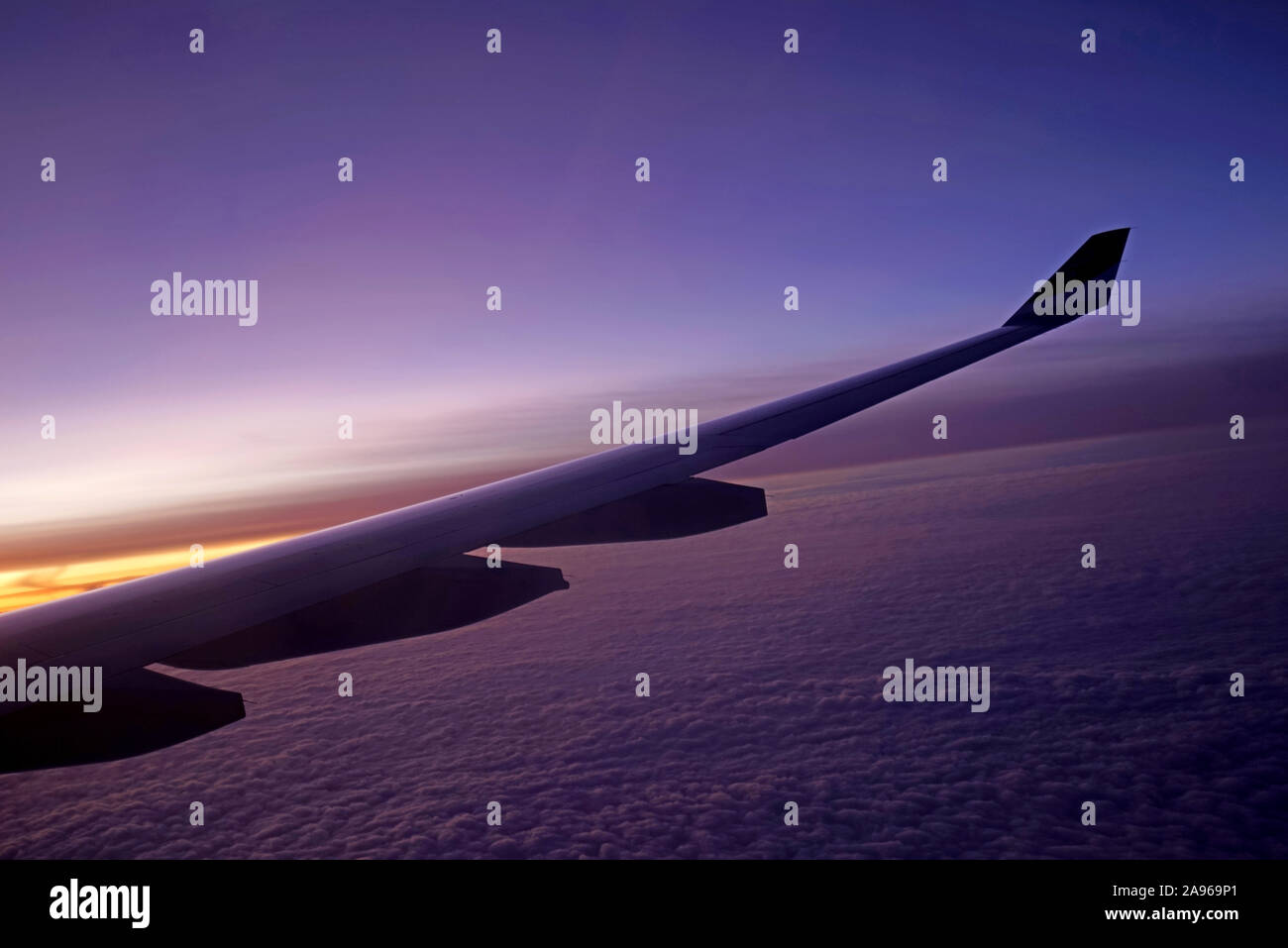 The plane, aeroplane wing, clouds, gradient sky from aerial view Stock ...