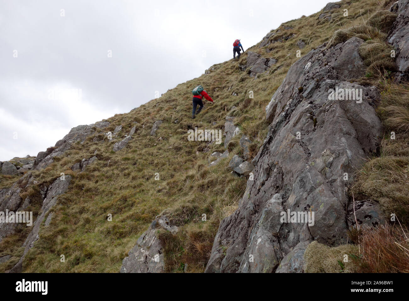 Two men climb hi-res stock photography and images - Alamy