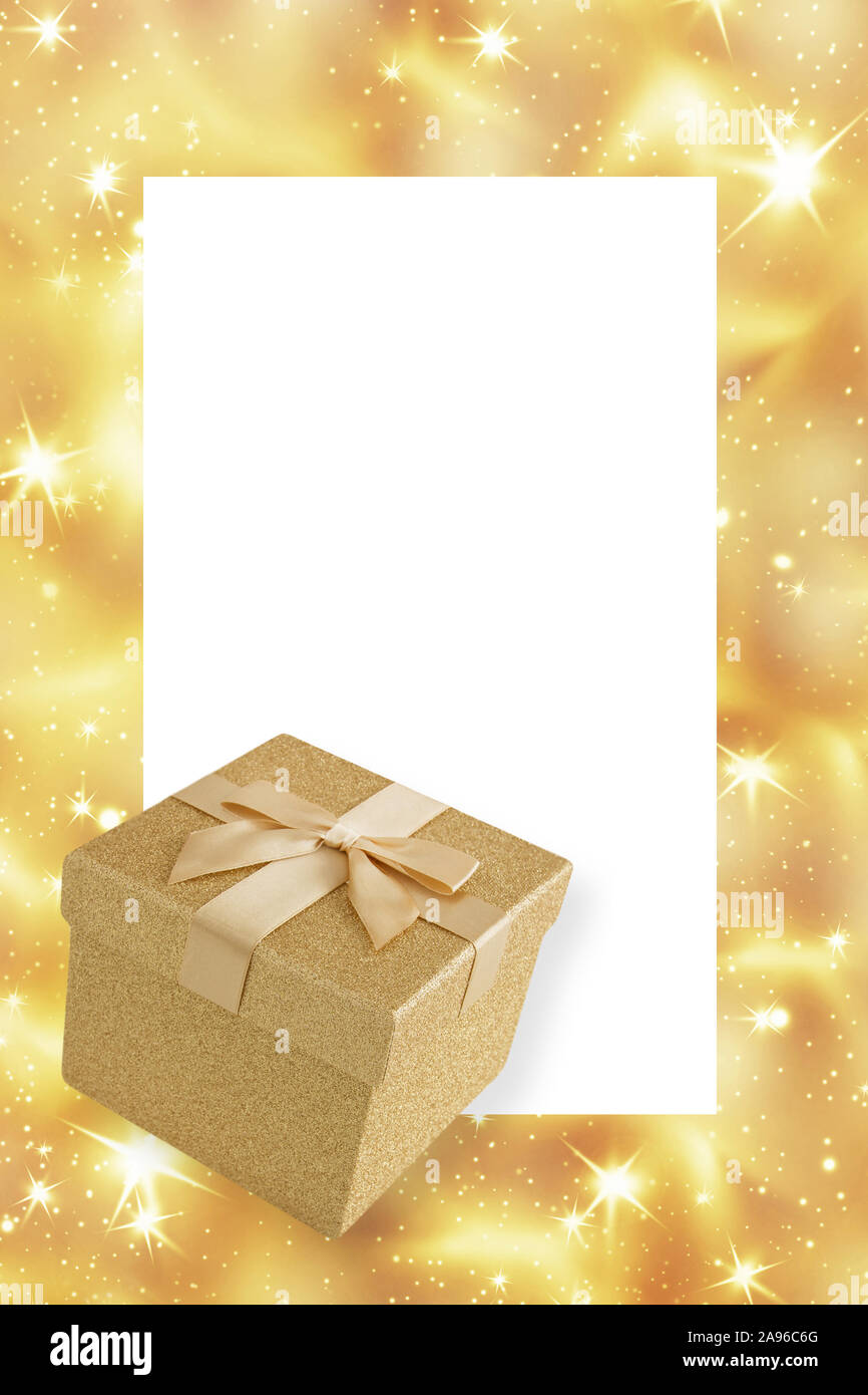 Golden gift against white background Stock Photo - Alamy