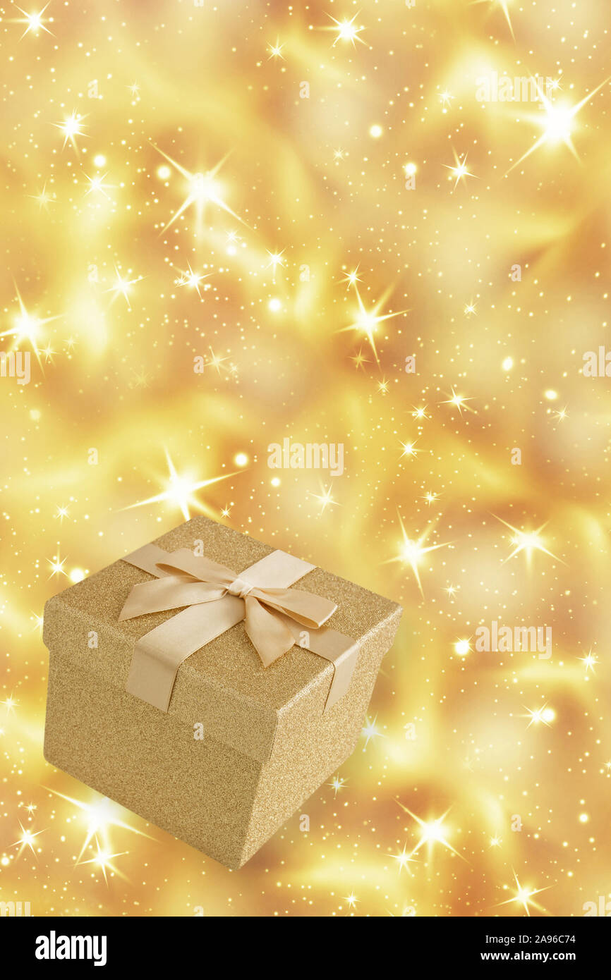 Golden gift and background stars Stock Photo - Alamy