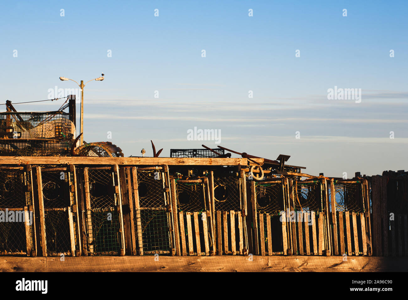 Lobster pots or traps and blue sky Stock Photo - Alamy