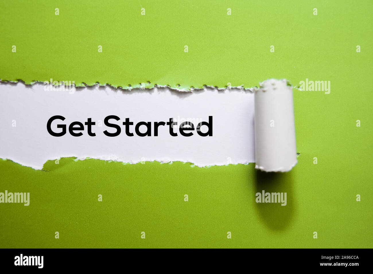 Get Started Text written in torn paper Stock Photo - Alamy