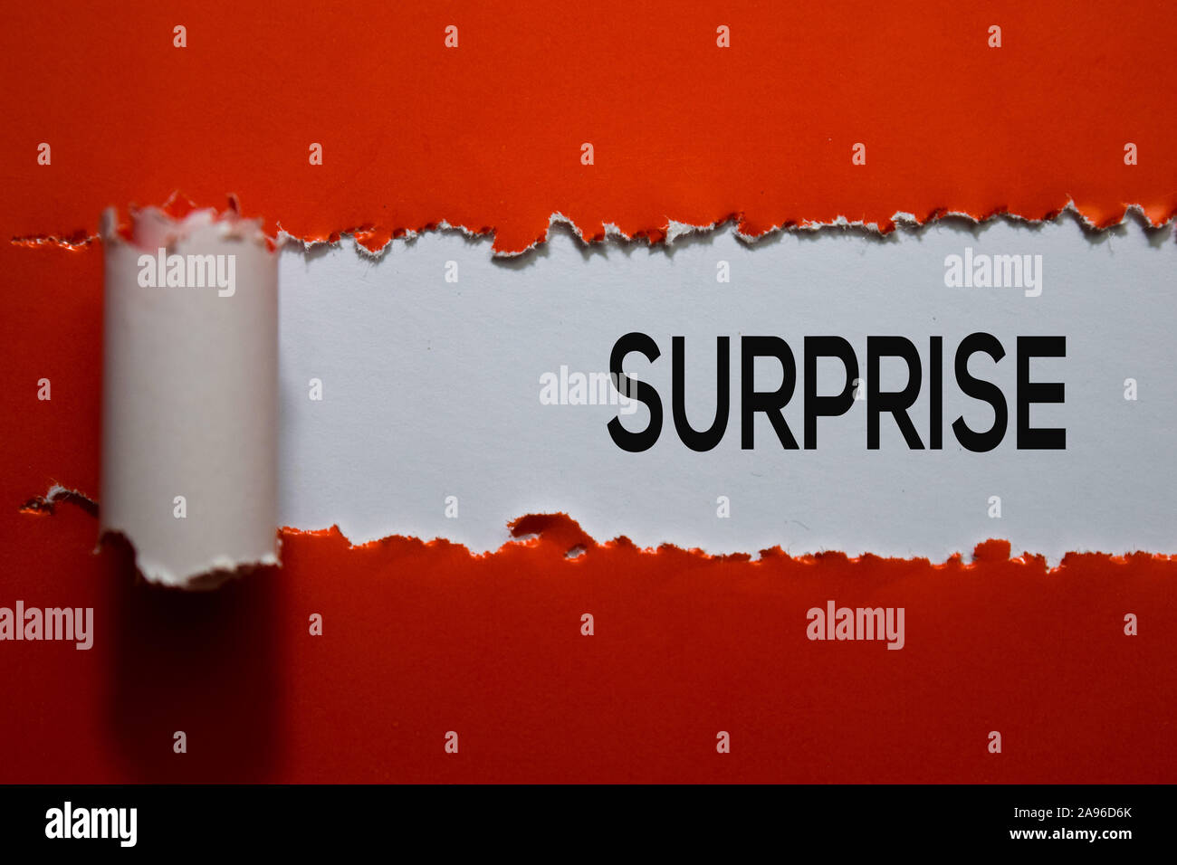 Surprise Text written in torn paper Stock Photo - Alamy
