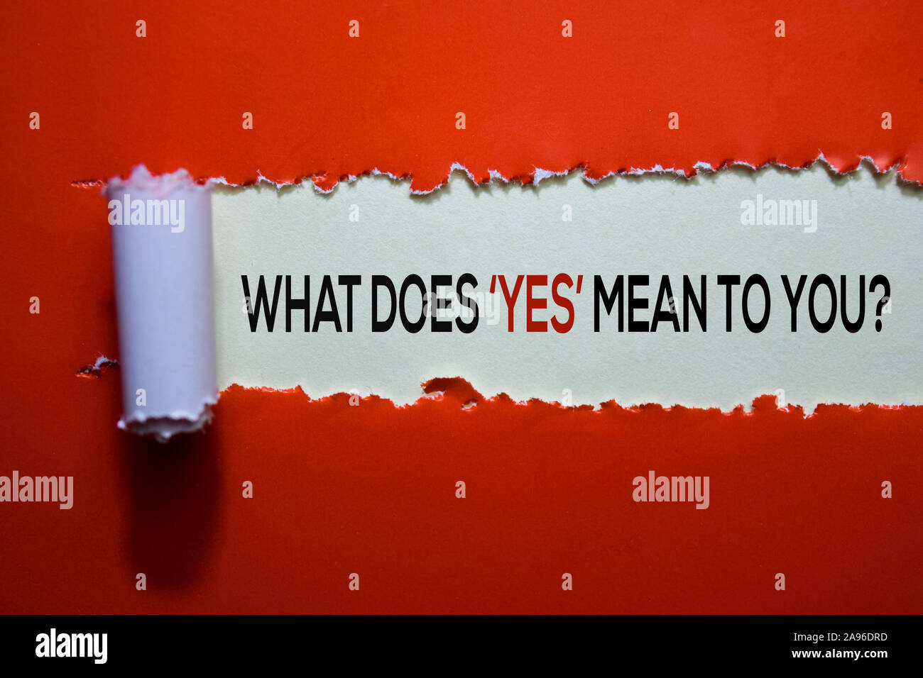 What Does YES Mean To You? Text written in torn paper Stock Photo - Alamy