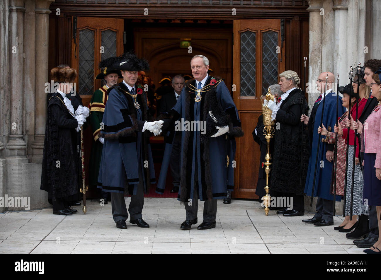 Peter estlin hands over to william russell hi-res stock photography and ...