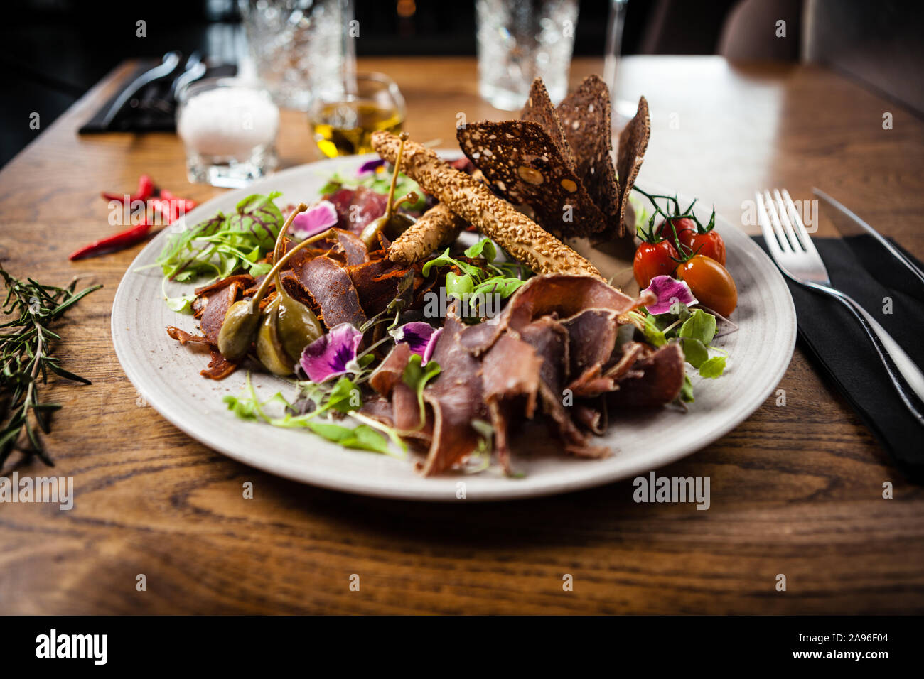 Meat platter for two served on a plate in restaurant Stock Photo - Alamy