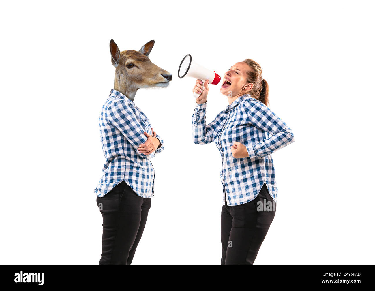 Portrait of young woman arguing with herself as a deer on white studio ...