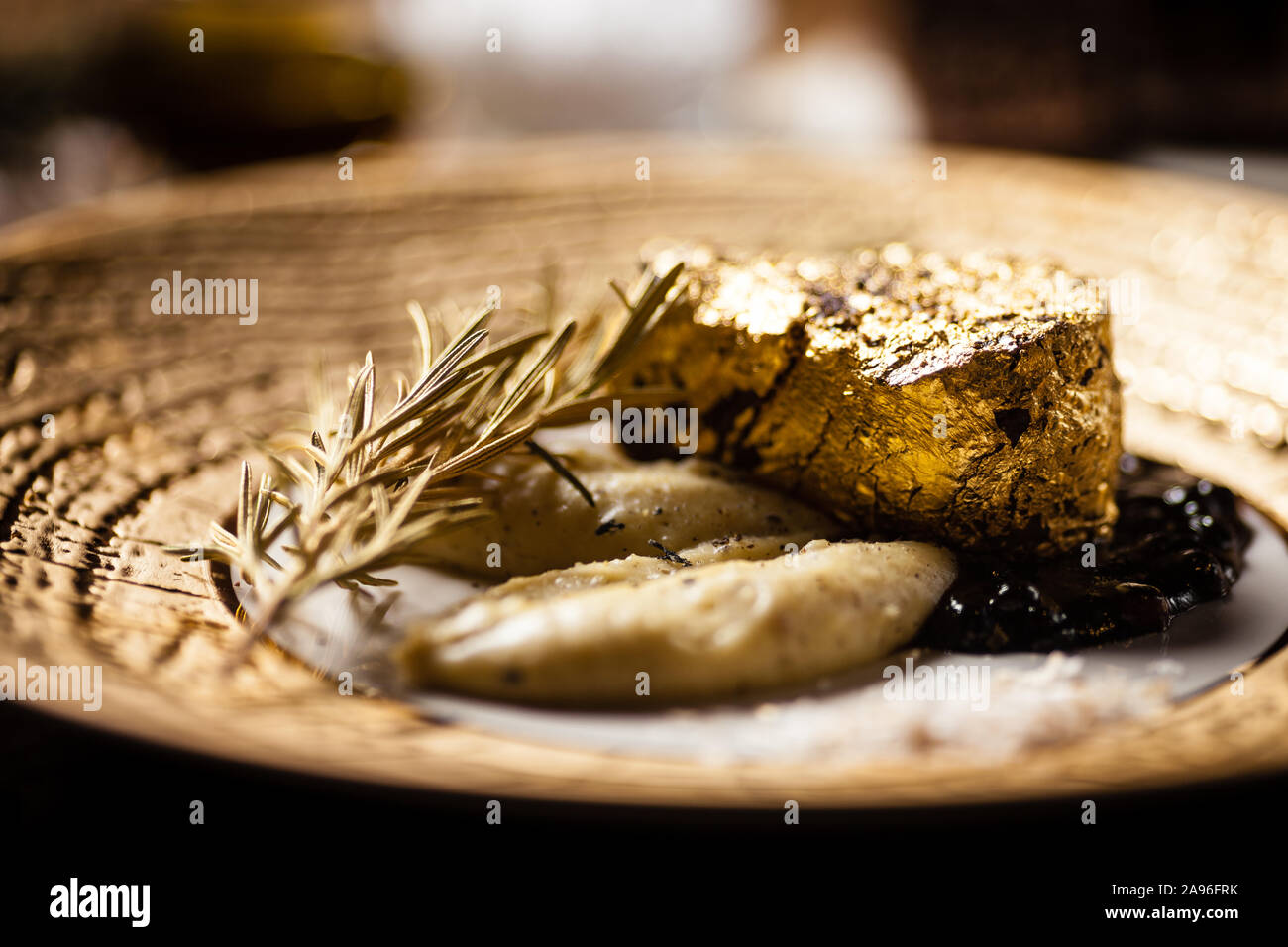 Black Angus tenderloin steak covered with 24 carat gold Stock Photo - Alamy
