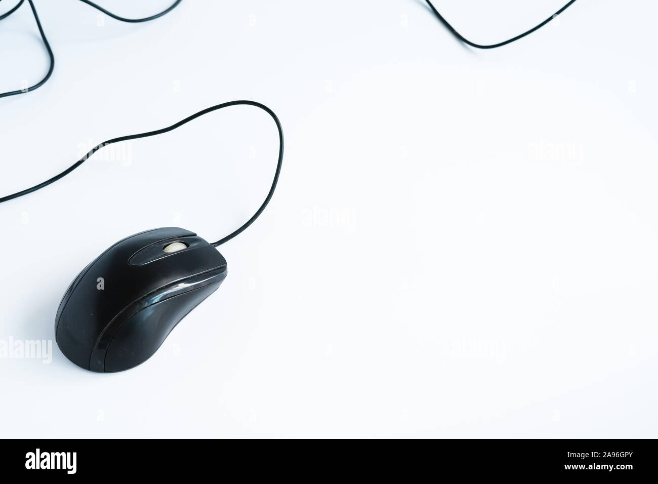 Modern black computer mouse on white background Stock Photo - Alamy