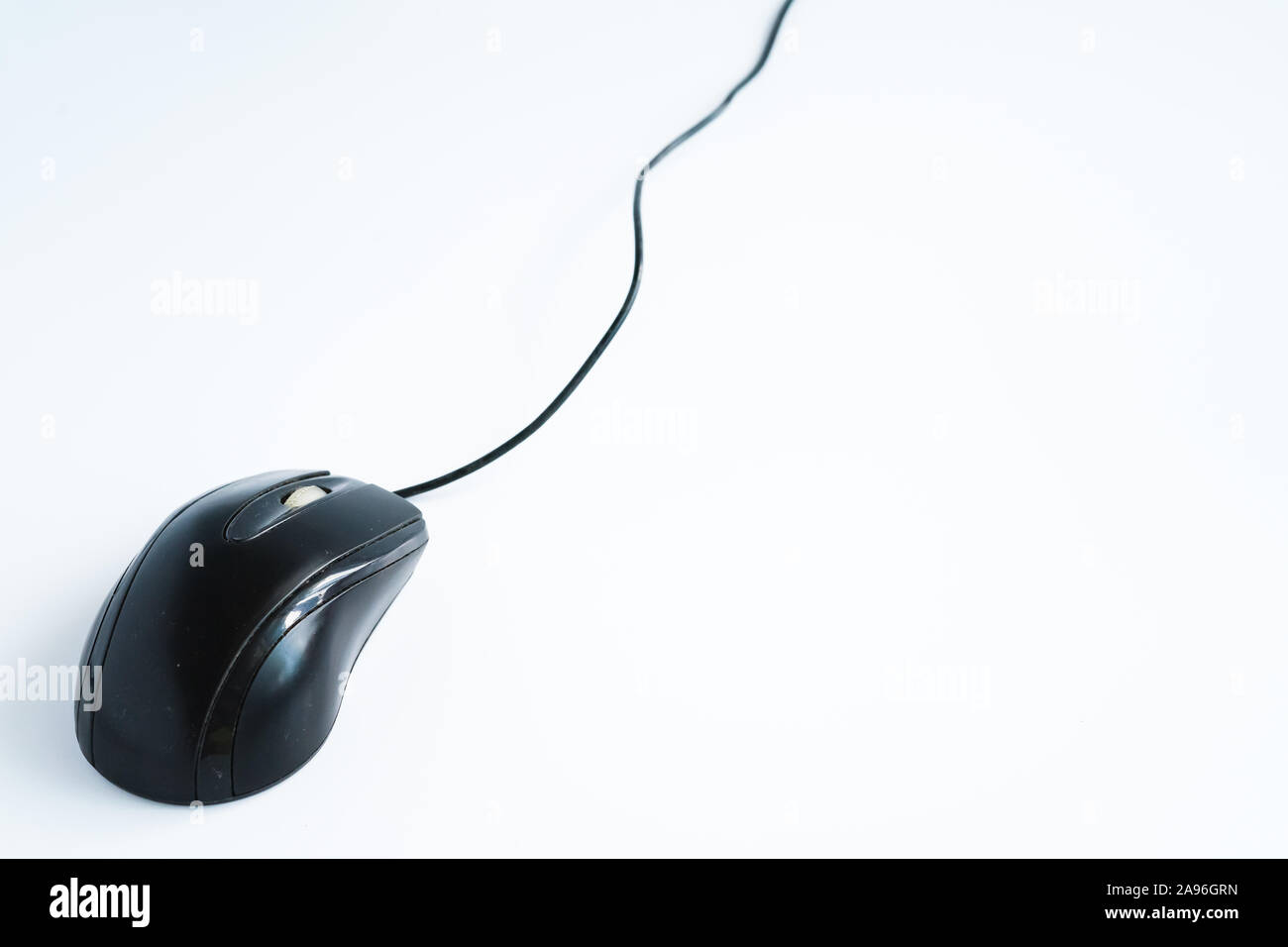Modern black computer mouse on white background Stock Photo - Alamy