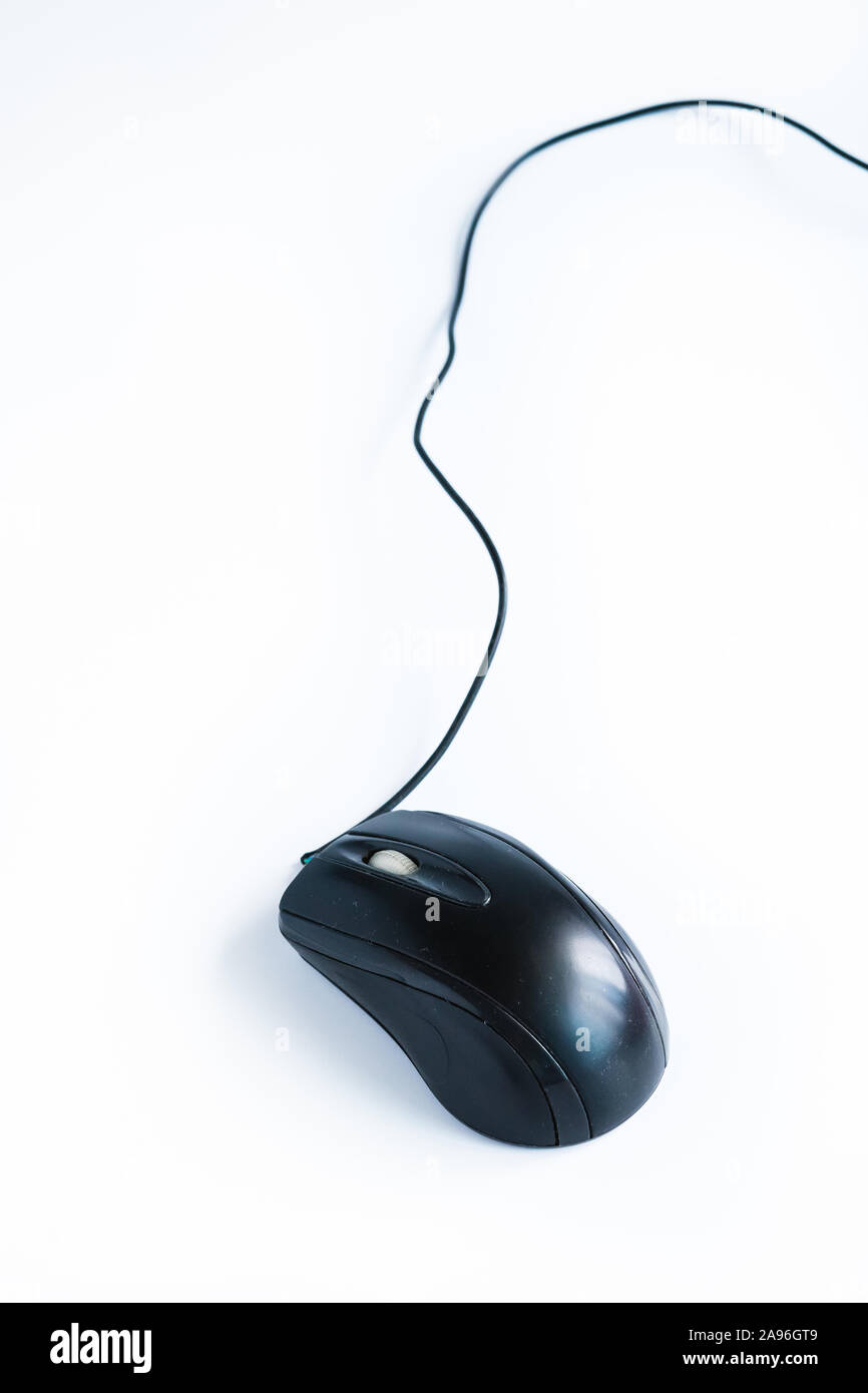 Modern black computer mouse on white background Stock Photo - Alamy