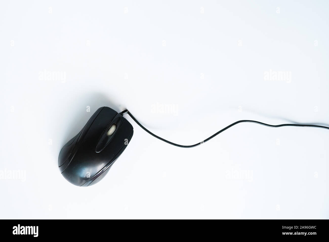Modern black computer mouse on white background Stock Photo - Alamy