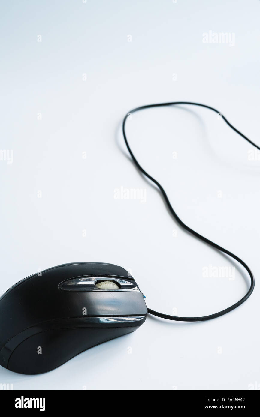 Modern black computer mouse on white background Stock Photo - Alamy