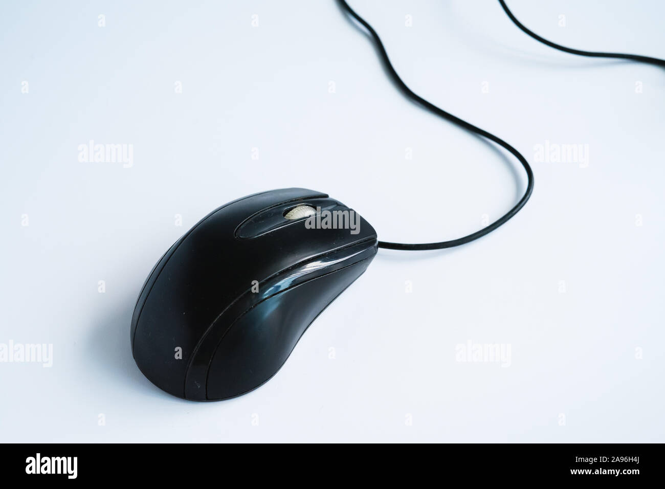 Modern black computer mouse on white background Stock Photo - Alamy