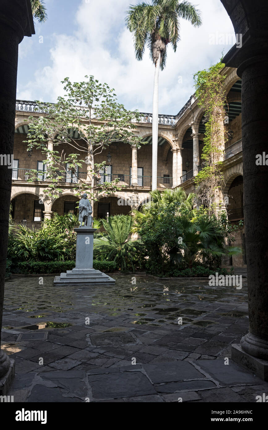 In the courtyard, is a statue of Christopher Columbus who discovered ...