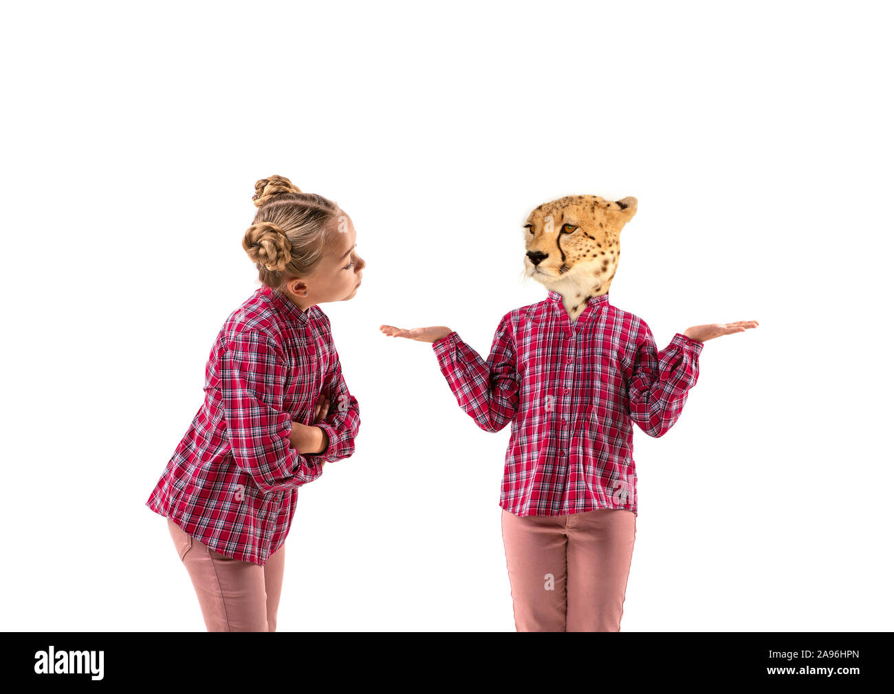 Young handsome girl arguing with herself as a leopard on white studio ...